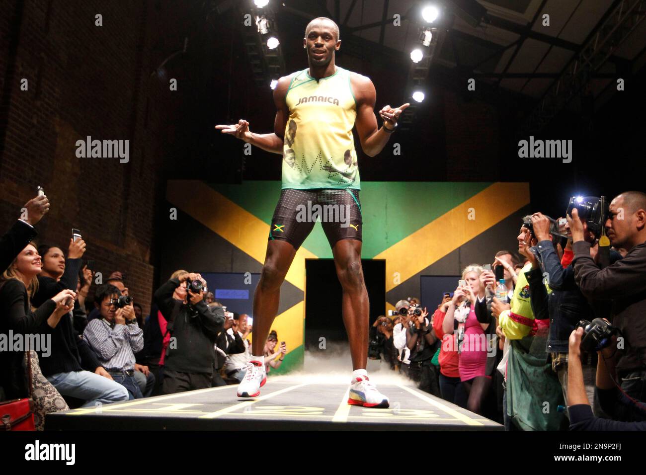 Jamaica's sprinter Usain Bolt models a Jamaica Olympic kit designed by ...