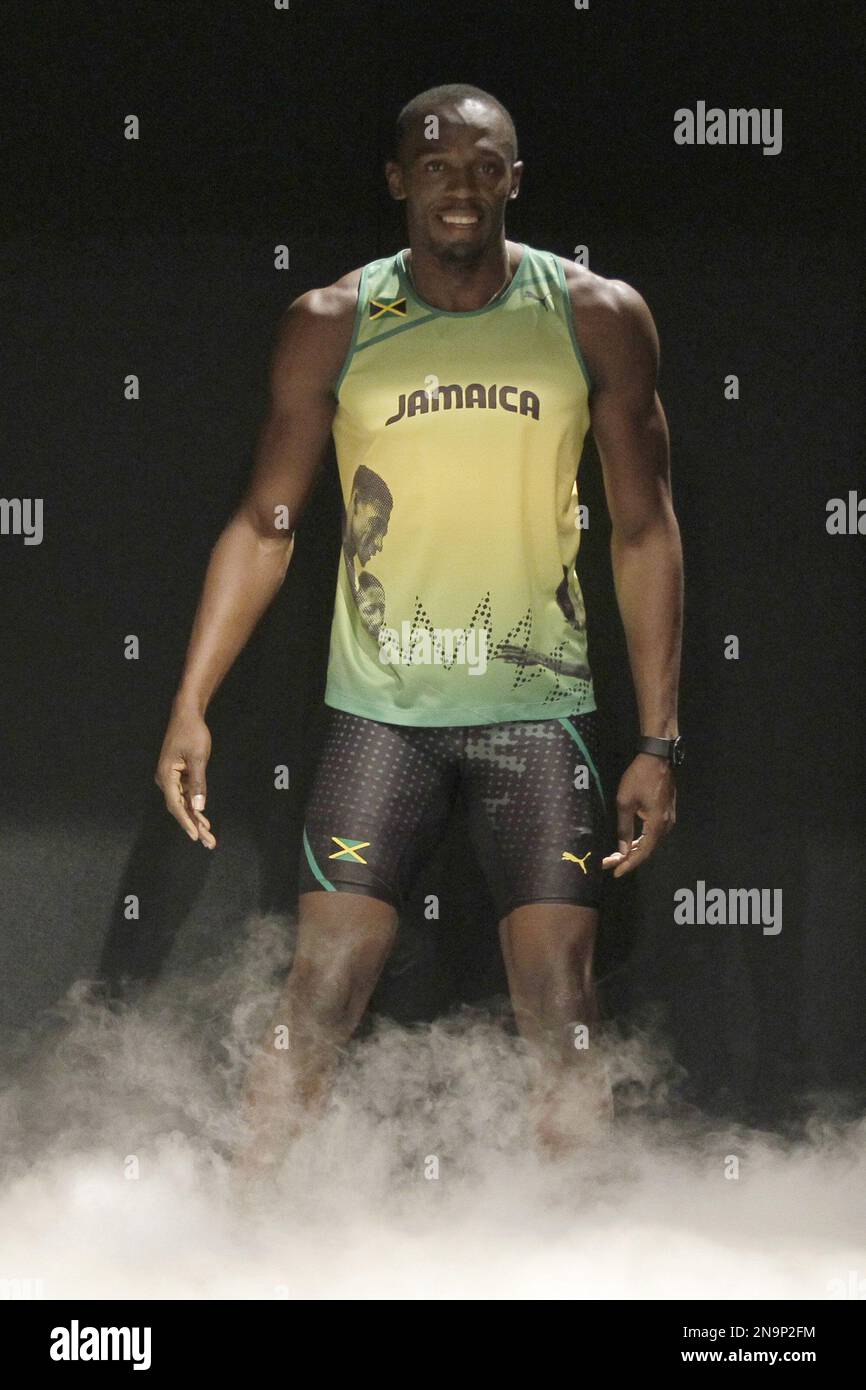 Jamaica's sprinter Usain Bolt models a Jamaica Olympic kit designed by ...