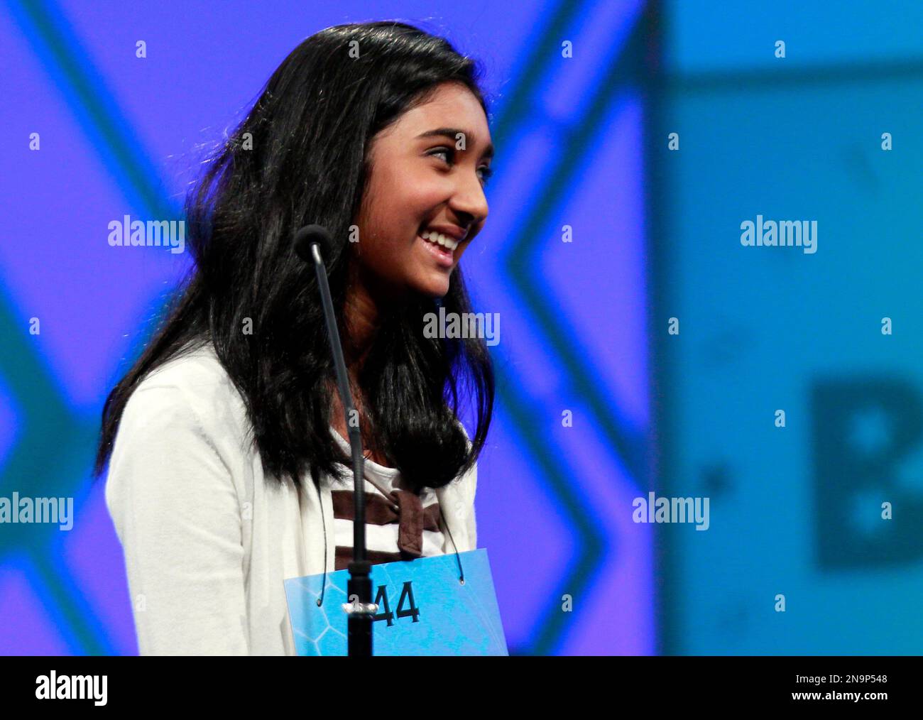 Stuti Mishra, 14, of West Melbourne, Fla., reacts after spelling a word ...