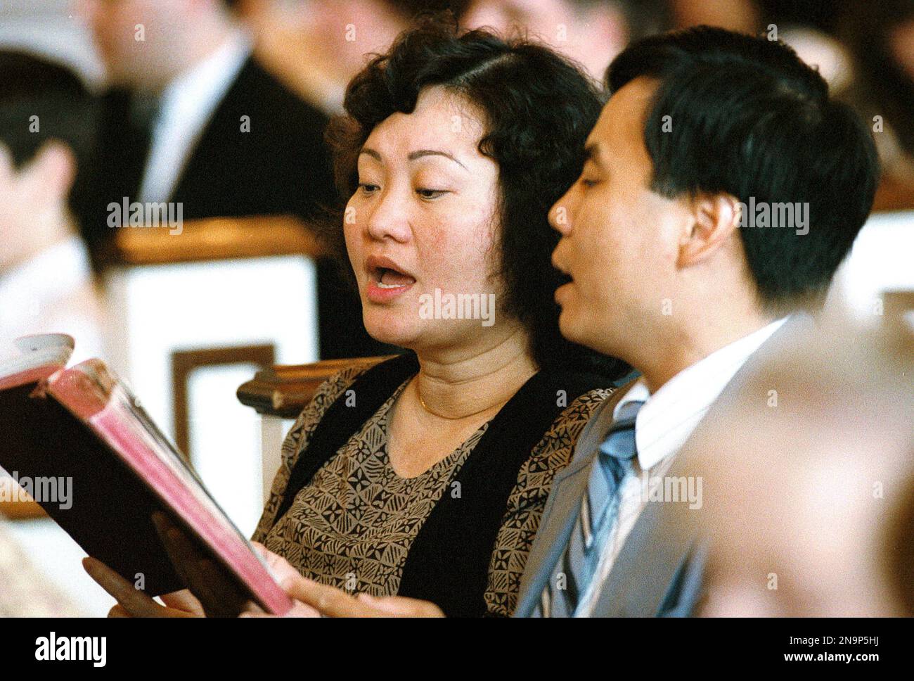 FILE - In this May 25, 1992 file photo, Phan Thi Kim Phuc and her husband, Bui Huy Toan, sing ...