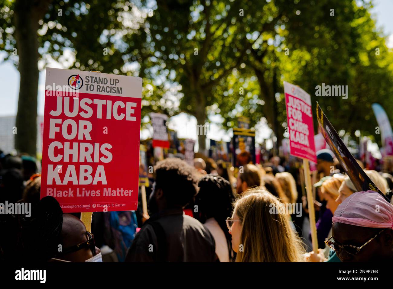 The demonstrators holding placards "justice for Chris" in front of new ...