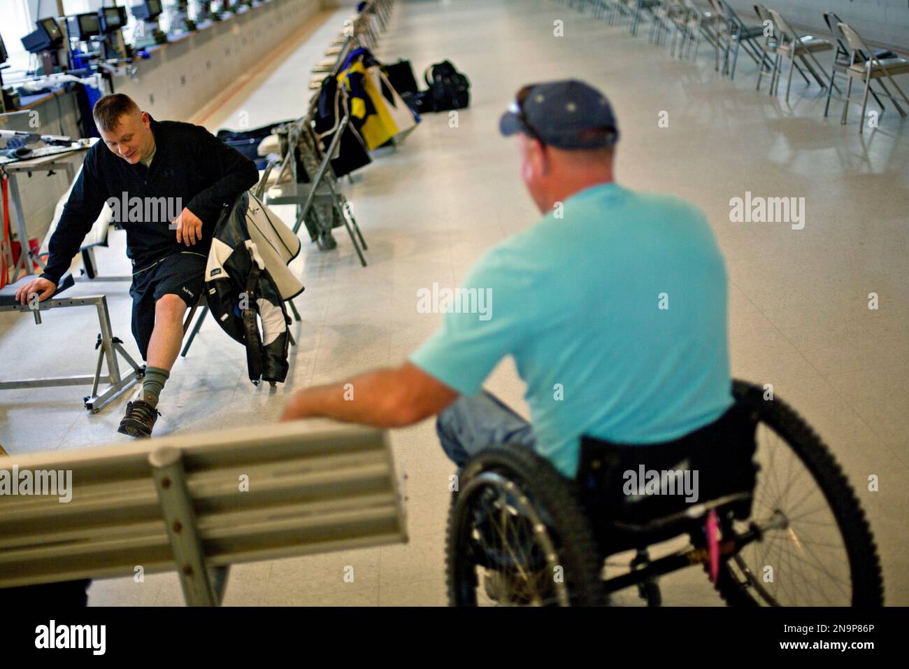 In this Wednesday, May 30, 2012 photo, U.S. Army Sgt. Josh Olson, left ...