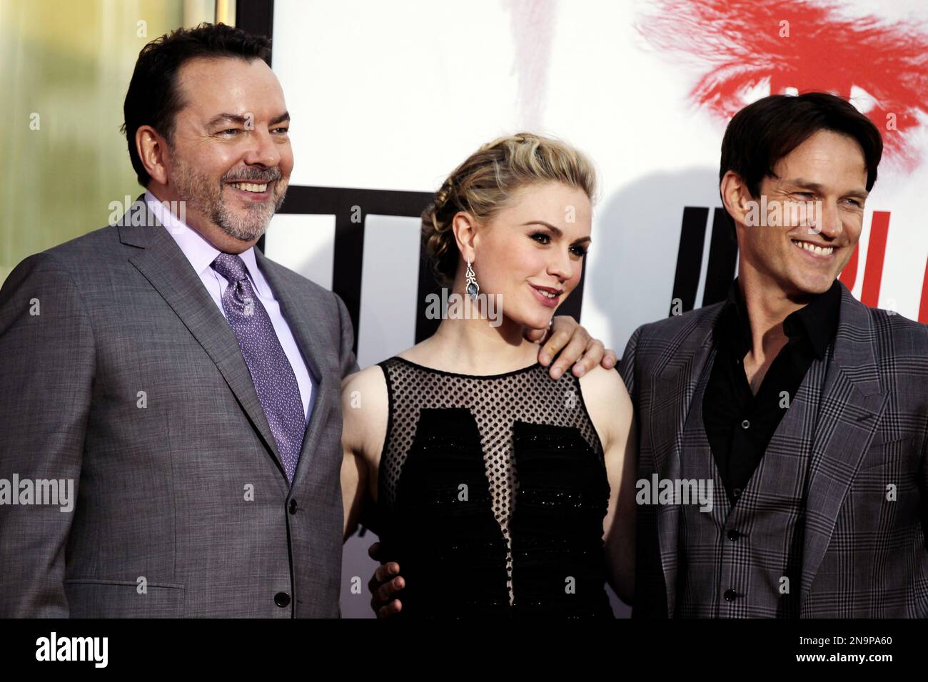 Alan Ball, left, Anna Paquin, cente,r and Stephen Moyer pose together ...