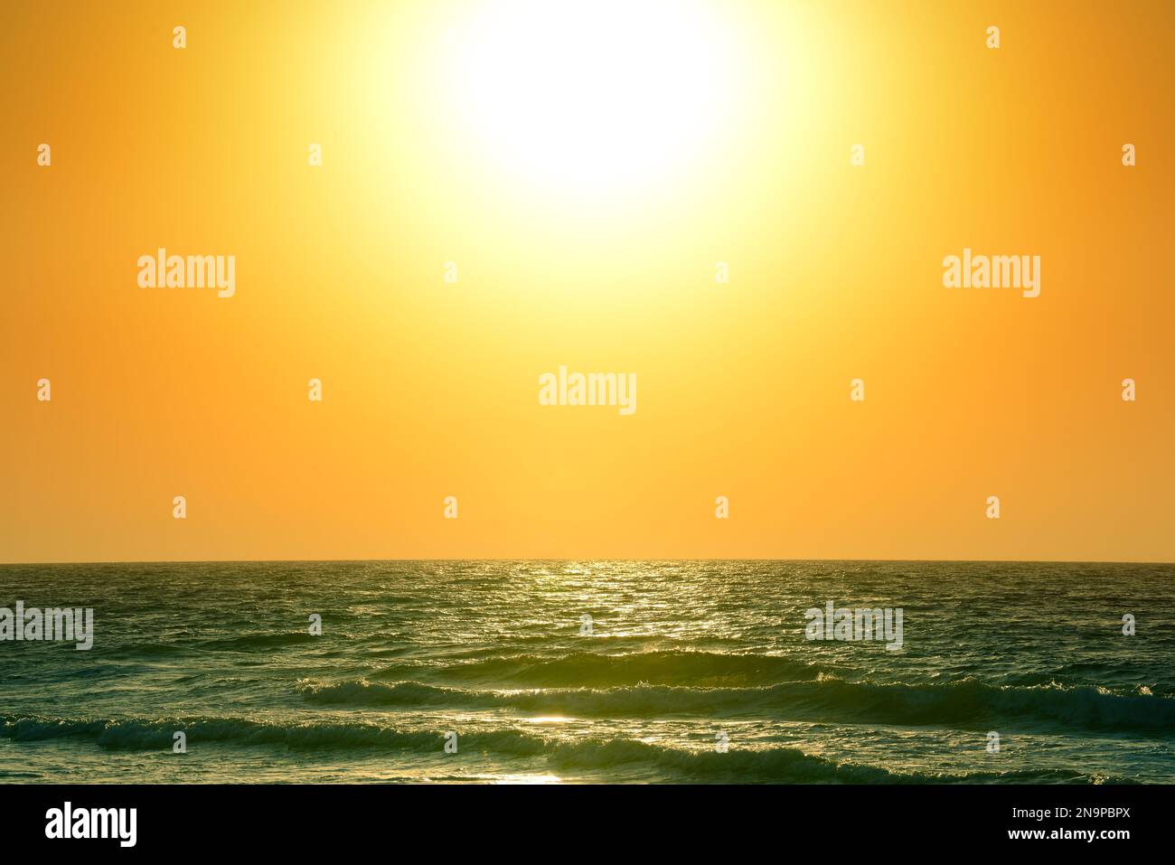 beautiful sunrise over the ocean Stock Photo - Alamy