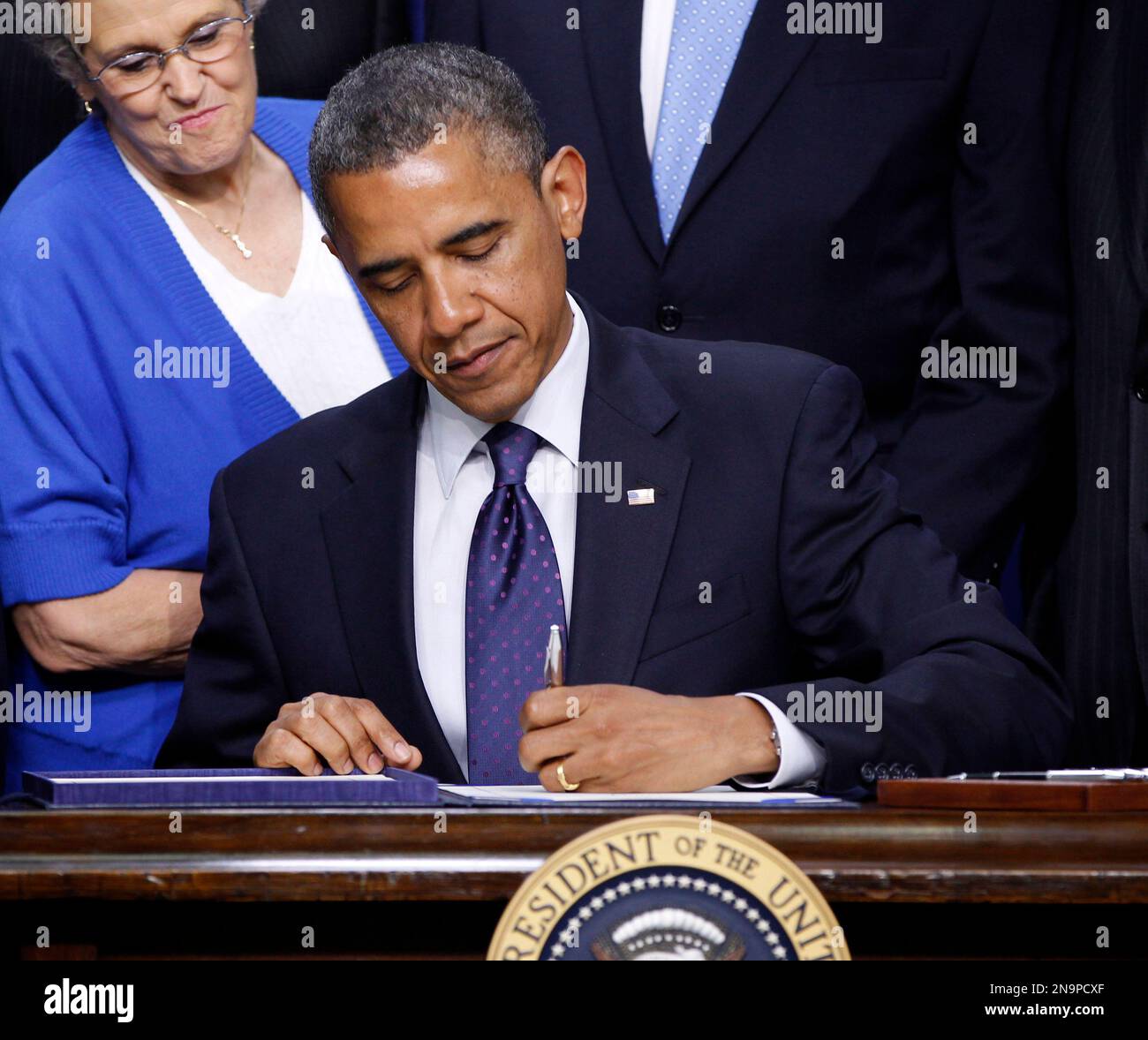 President Barack Obama signs the reauthorization of the Export-Import ...