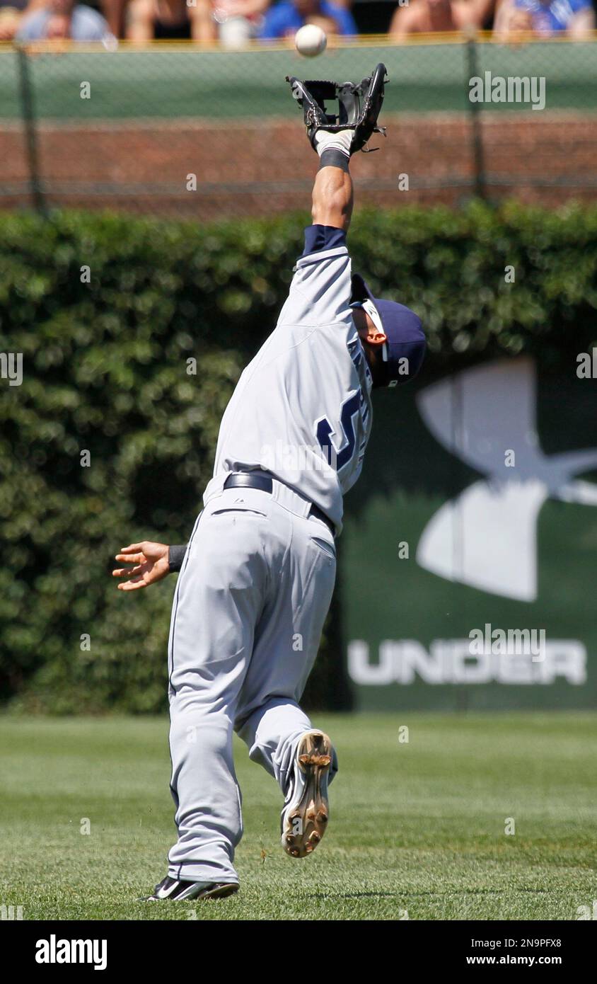 San Diego Padres second baseman Alexi Amarista reaches over his ...