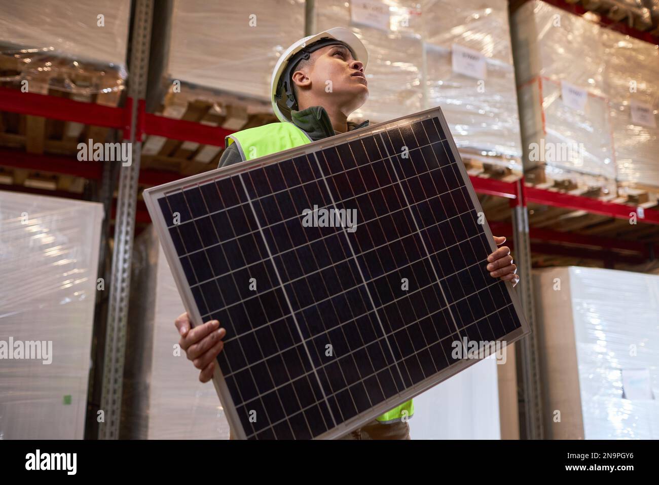 Black worker solar panel hi-res stock photography and images - Alamy