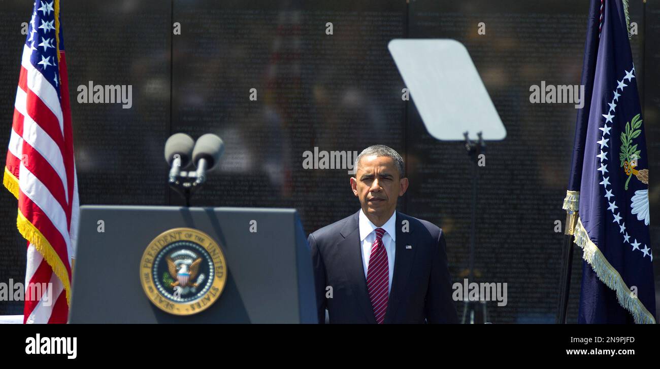 President Barack Obama arrives to speak during a Memorial Day ceremony ...