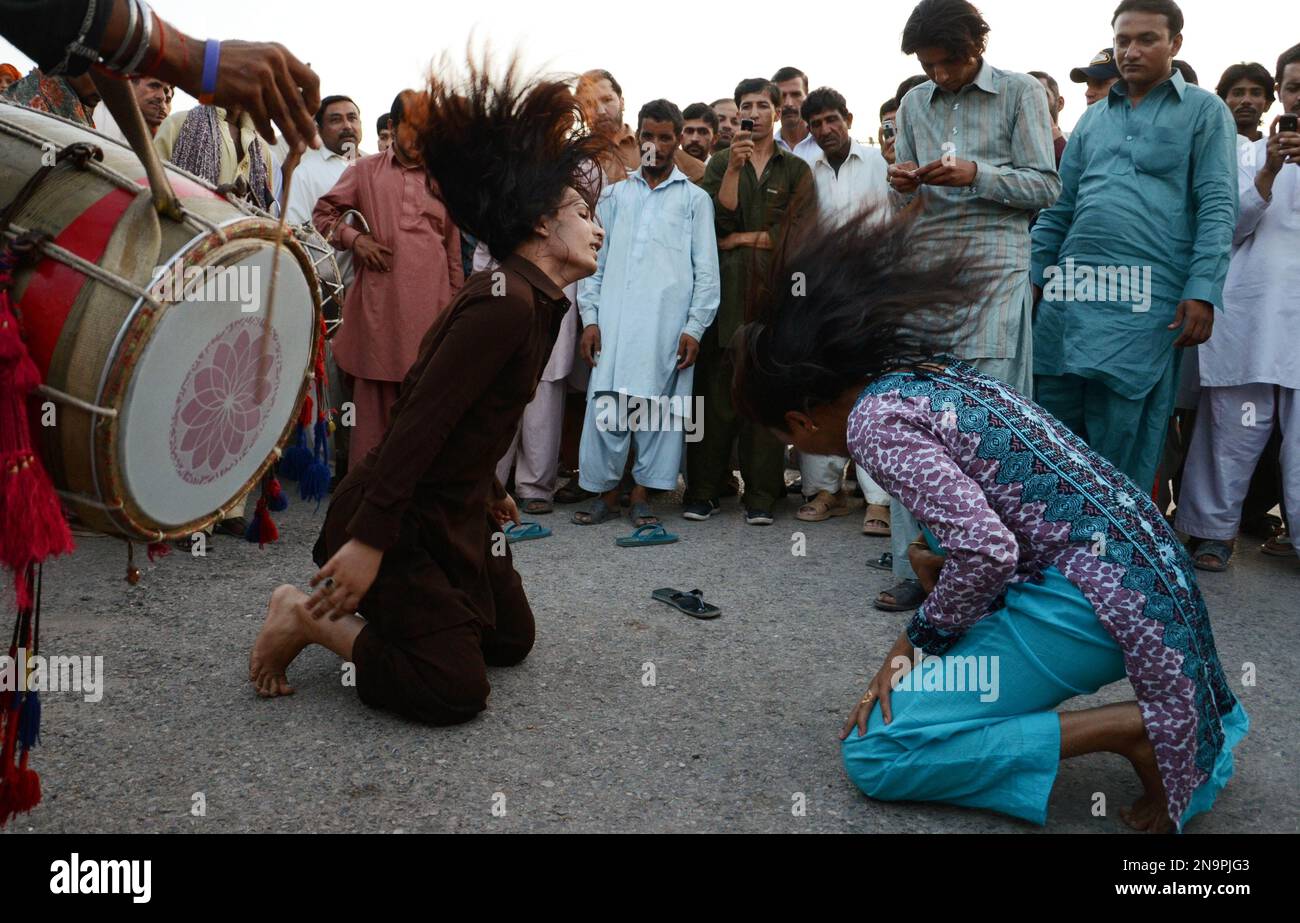 Pakistani eunuchs dance at a local shrine in a suburb of Islamabad ...