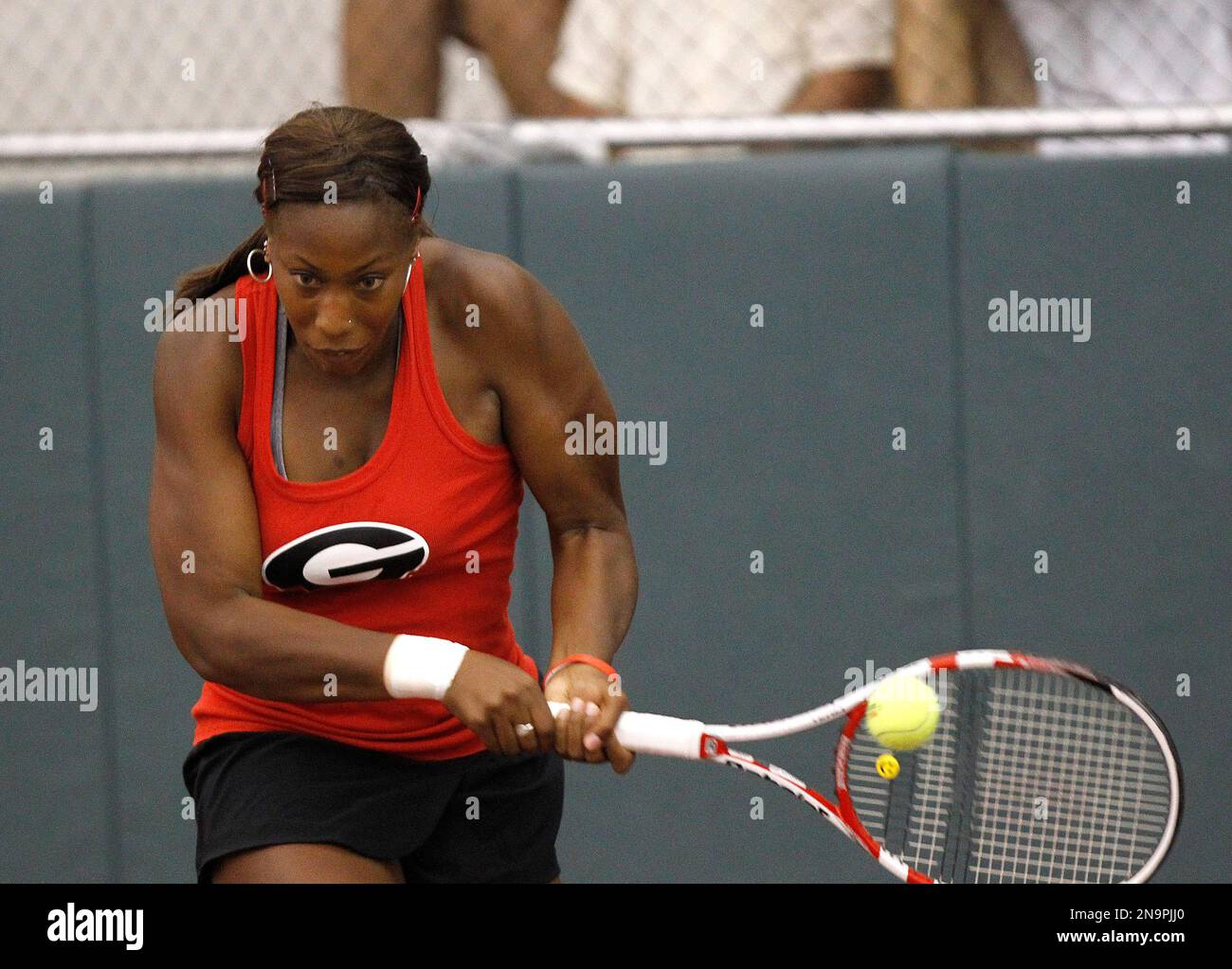 Georgia's Nadja Gilchrist returns a shot during a doubles match against ...