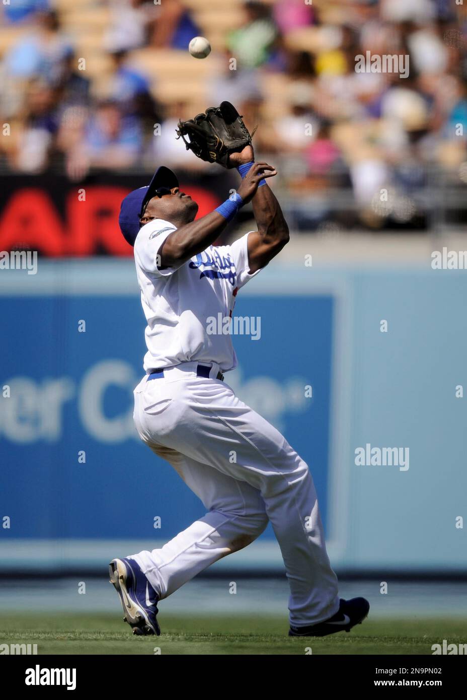 Los Angeles Dodgers second baseman Elian Herrera gets under a fly ball ...