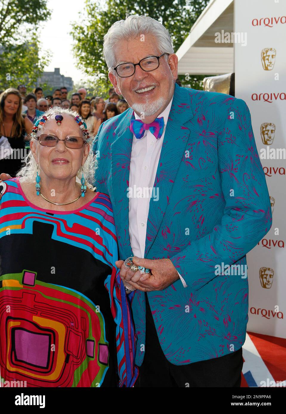 Australian entertainer Rolf Harris and his wife Alwen arrive for the ...