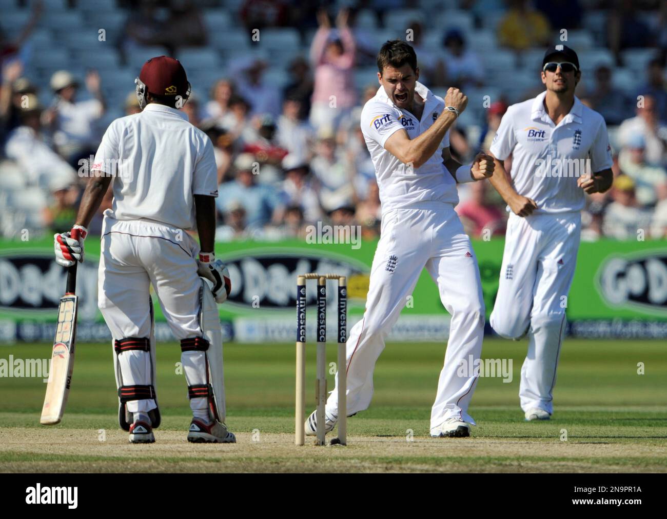 England's James Anderson, center, claims the wicket of West Indies ...