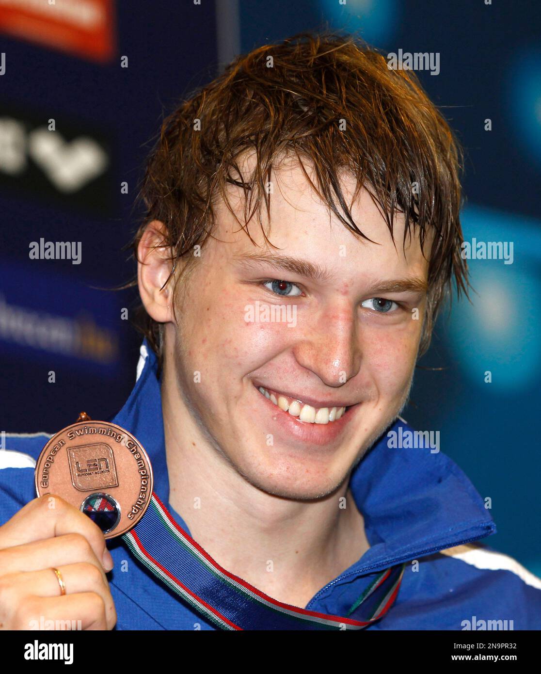Ukraine's Andriy Govorov displays the bronze medal he won in the 50 ...