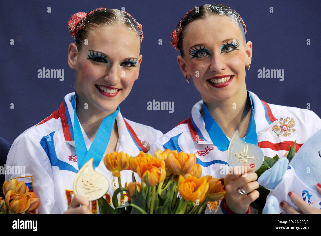 Natalia Ischenko, right, and Svetlana Romashina of Russia pose with ...