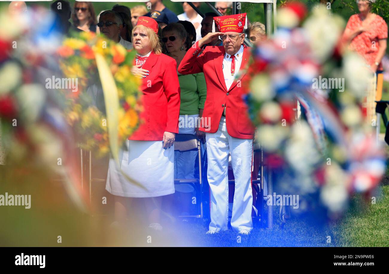 Lorraine Brooks and Frank Aleck salute during Memorial Day ceremonies ...