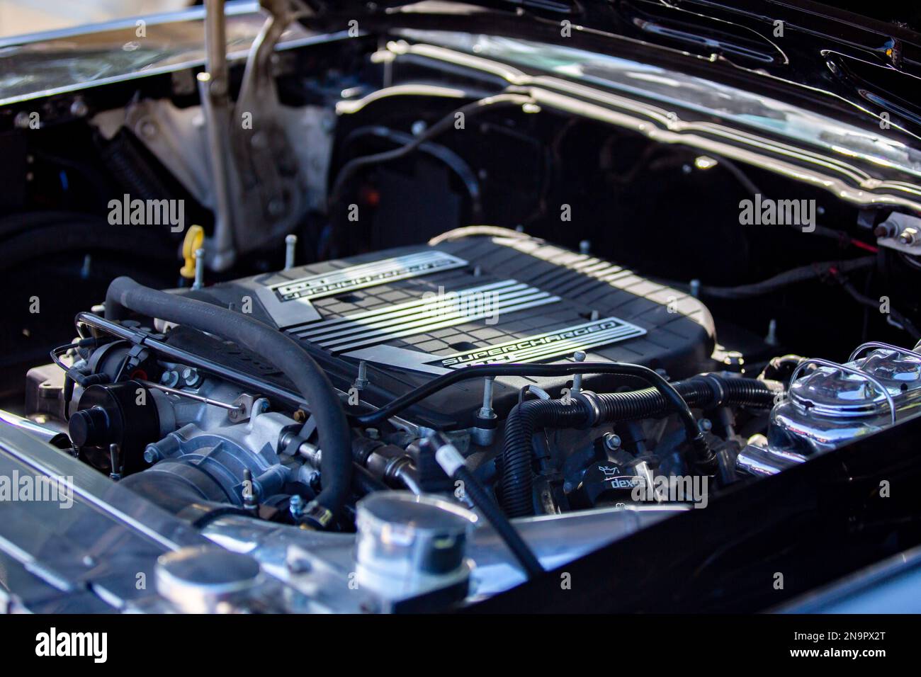 A closeup of a motor of a motor of Chevrolet Camaro Sport Car Stock ...