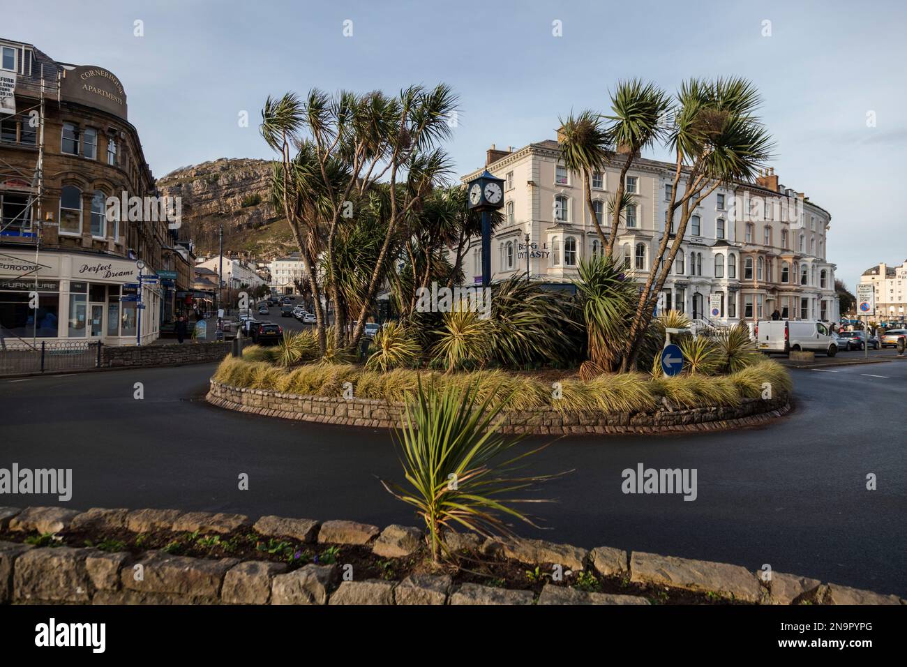 The seafront at Llandudno,North Wales,UK with a roundabout decorated ...