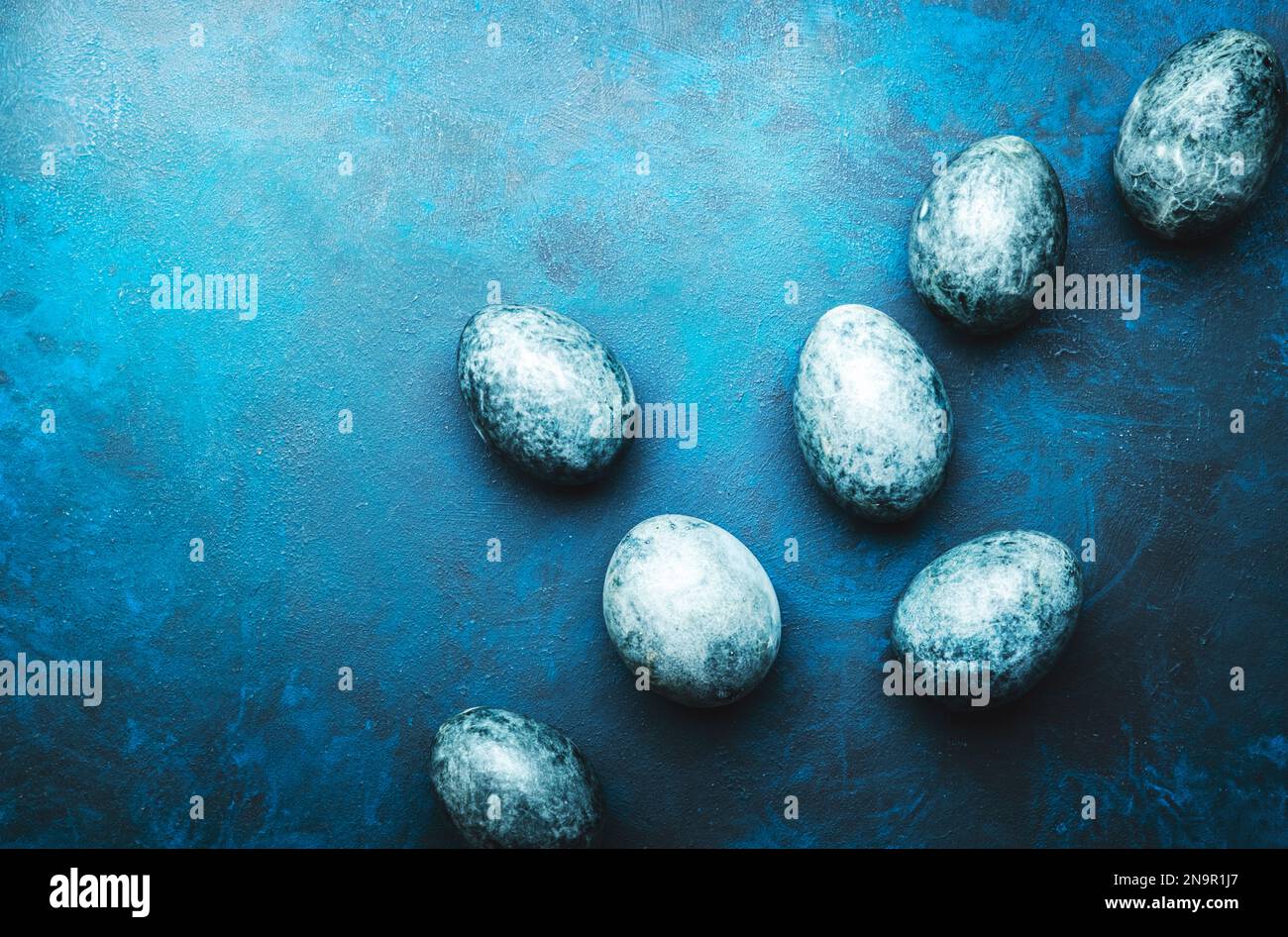 Stylish blue painted eggs hi-res stock photography and images - Alamy