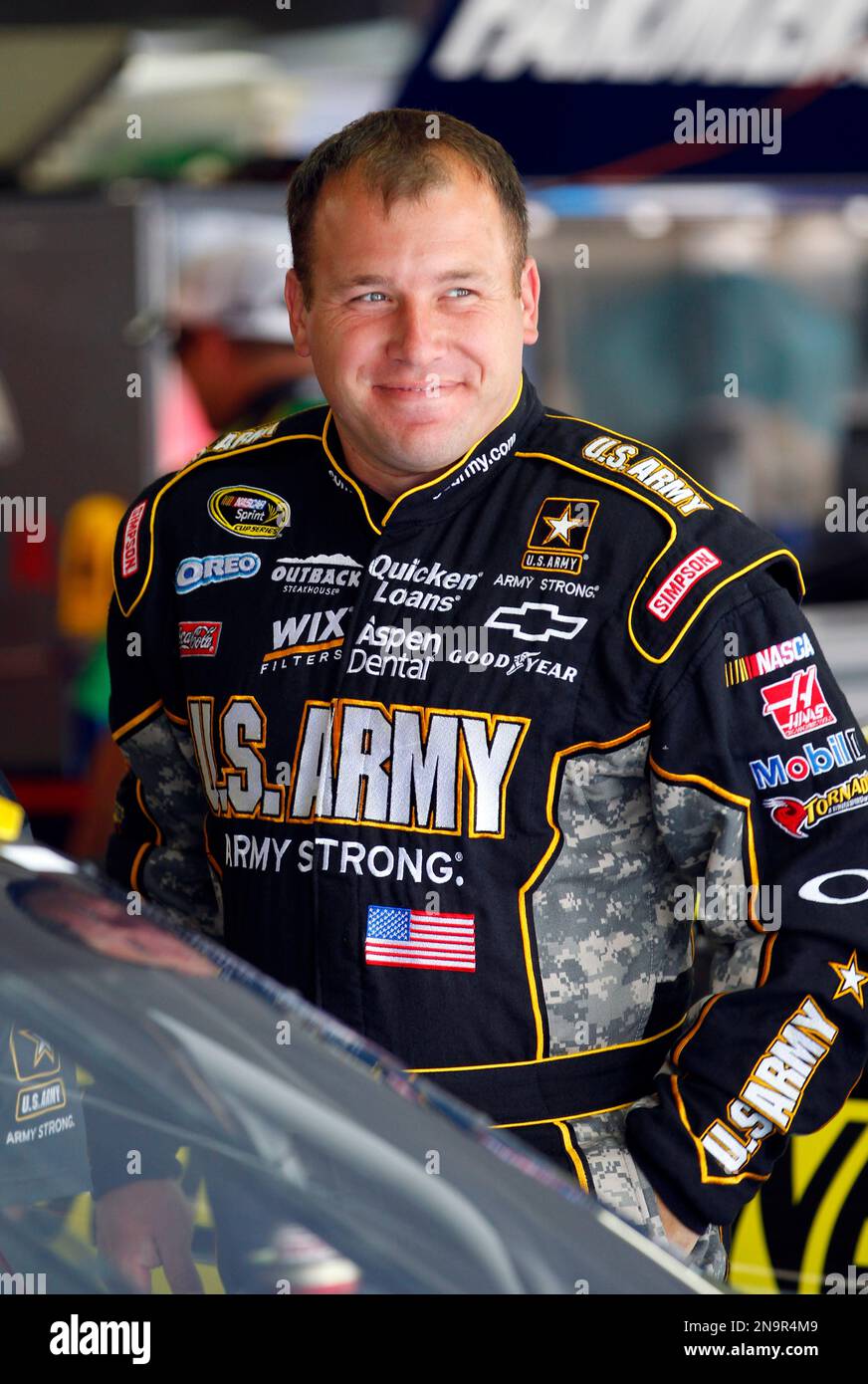 Ryan Newman stands outside his car during practice for Sunday's NASCAR ...