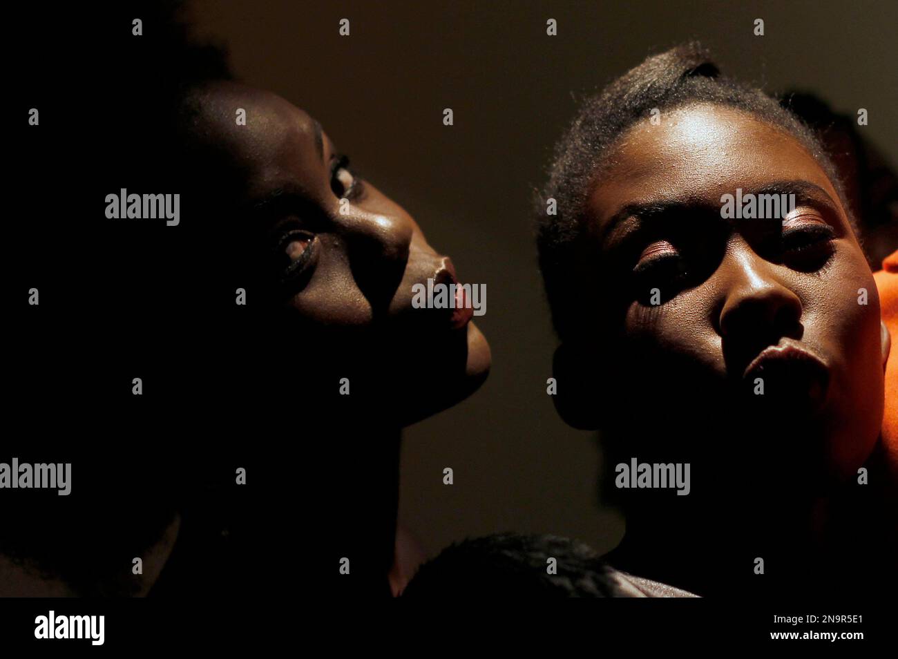 Fashion models wait backstage at the first day of the Soweto Fashion ...