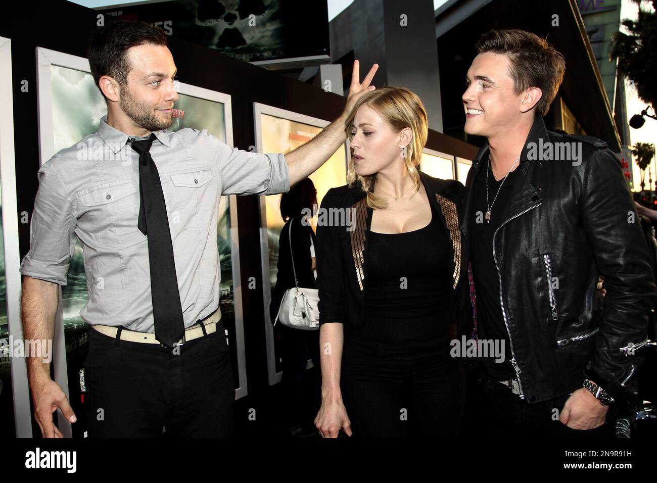 Cast members Jonathan Sadowski, left, Olivia Taylor Dudley, center, and ...