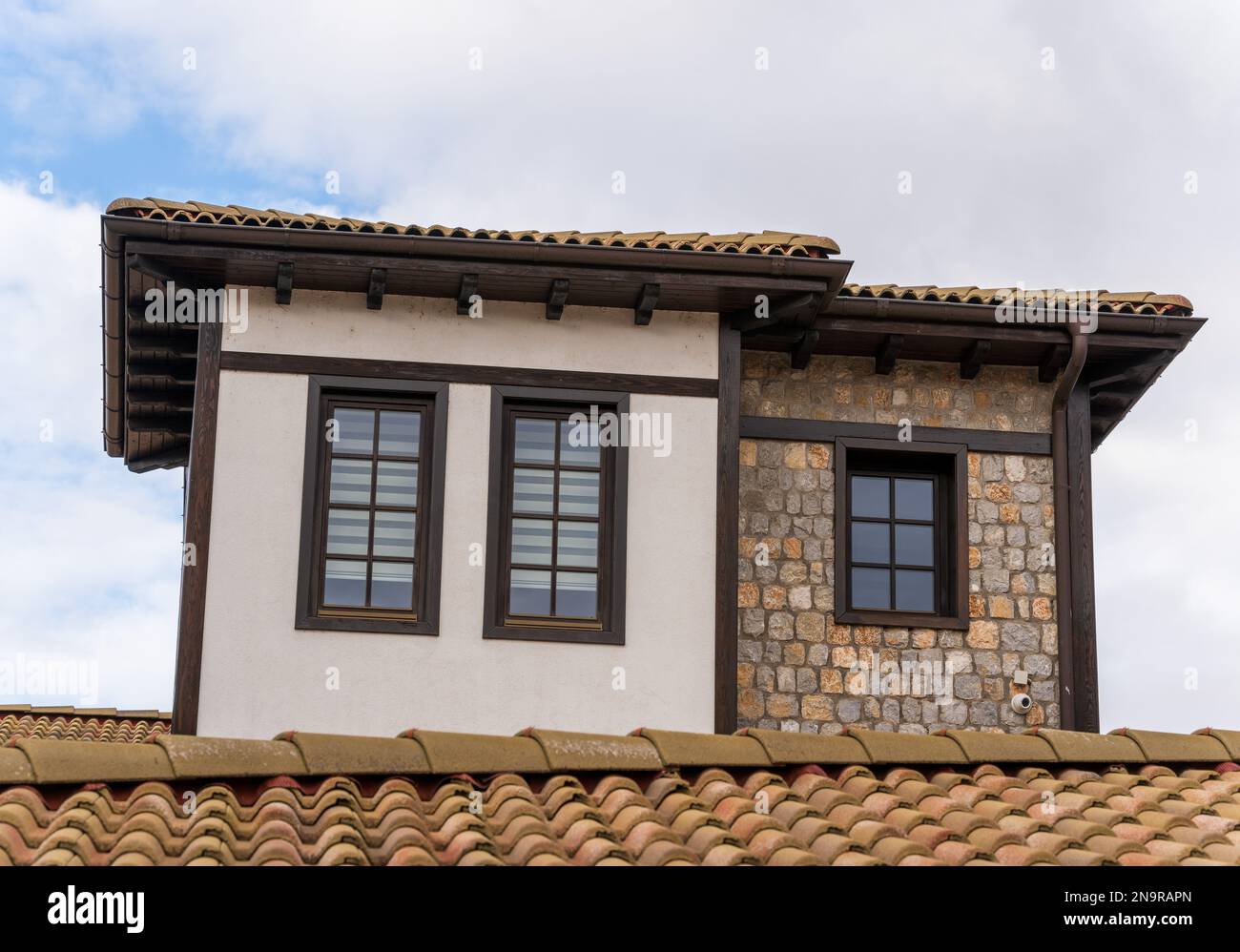 The facade of the upper floor of a building in the old Macedonian ...