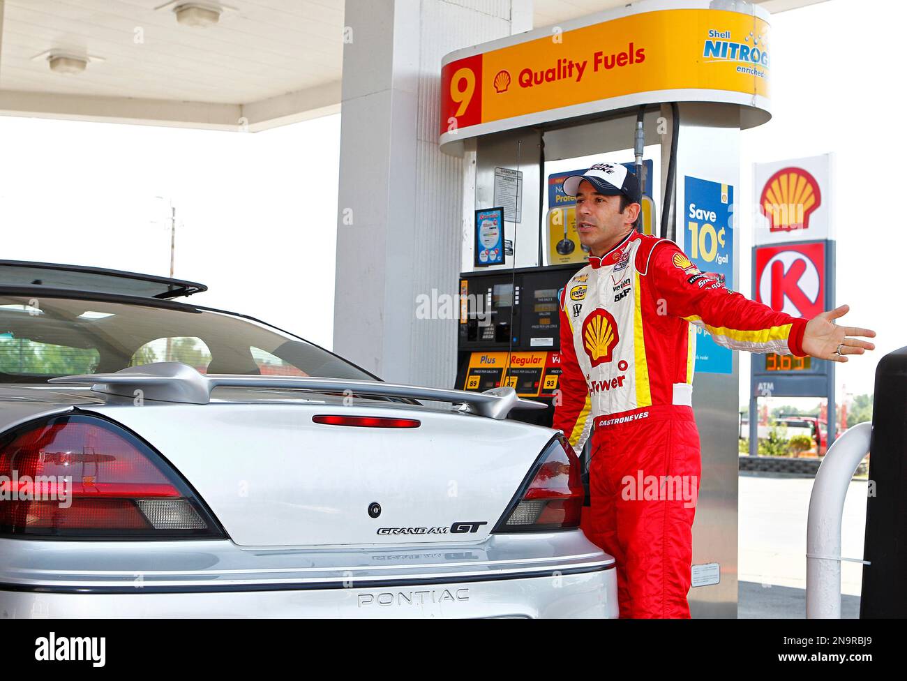 Helio Castroneves at a Shell station in Speedway, IN, where the 3-time ...