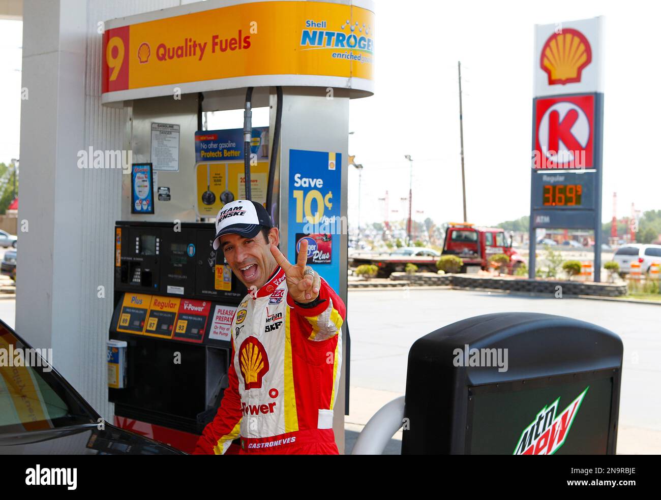 Helio Castroneves at a Shell station in Speedway, IN, where the 3-time ...
