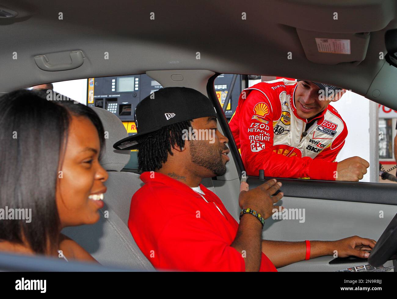 Helio Castroneves at a Shell station in Speedway, IN, where the 3-time ...