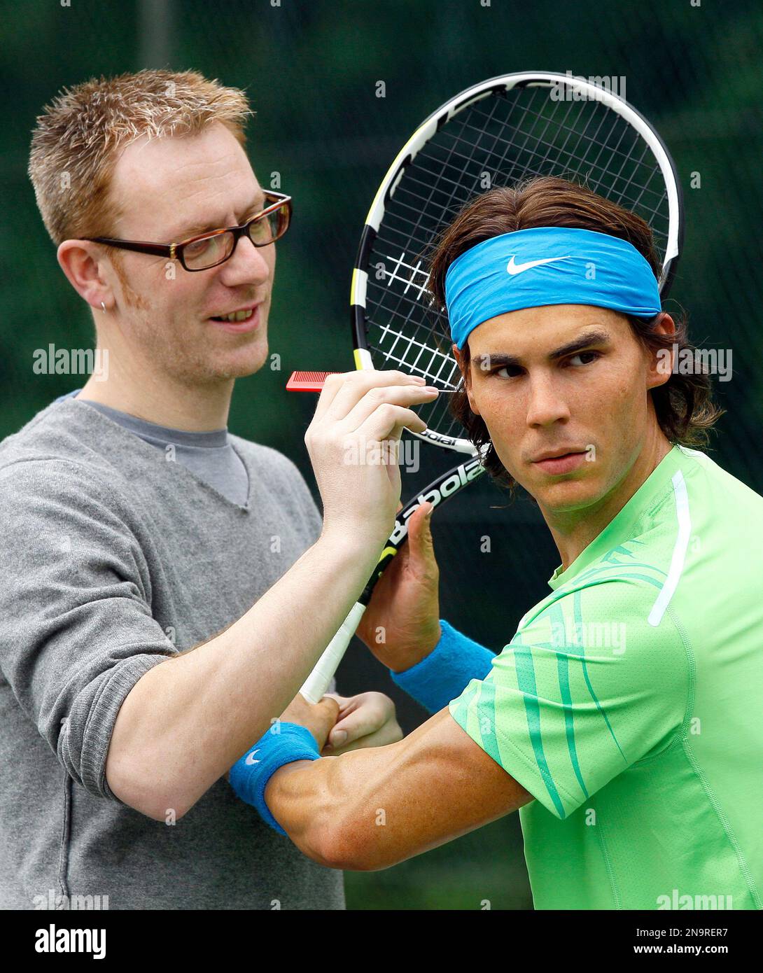 Roger Mackay, one of Madame Tussauds maintenance team puts finishing ...