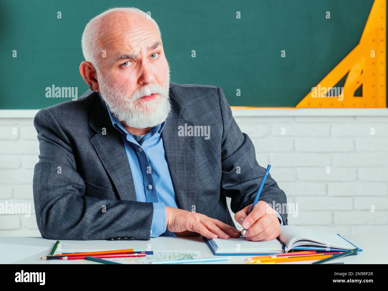 A teacher who works professionally. A teacher who knows a lot. Teacher ...