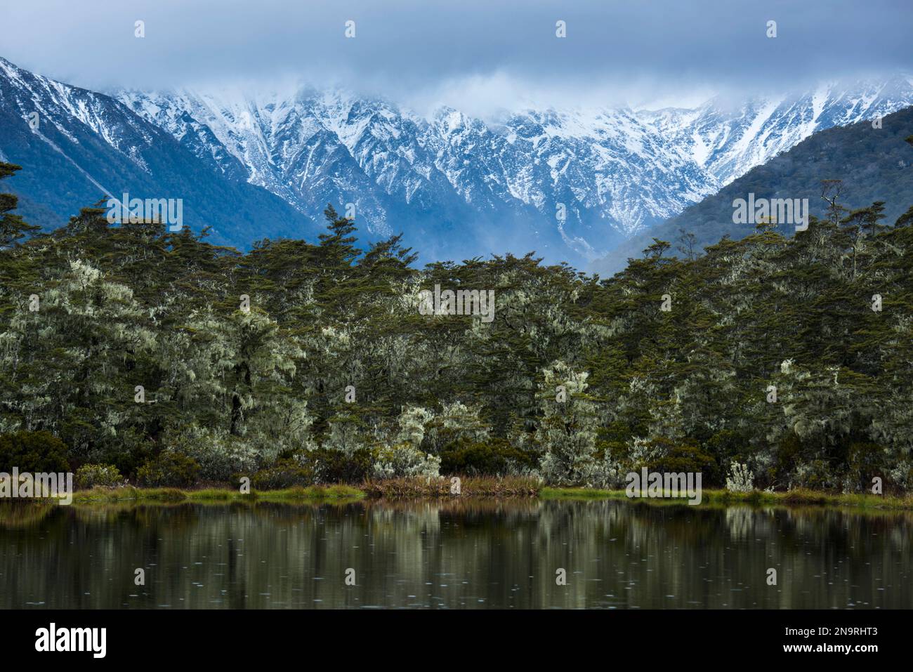 Mountain lake at Lewis Pass with mountains of the Hammer Range in the ...