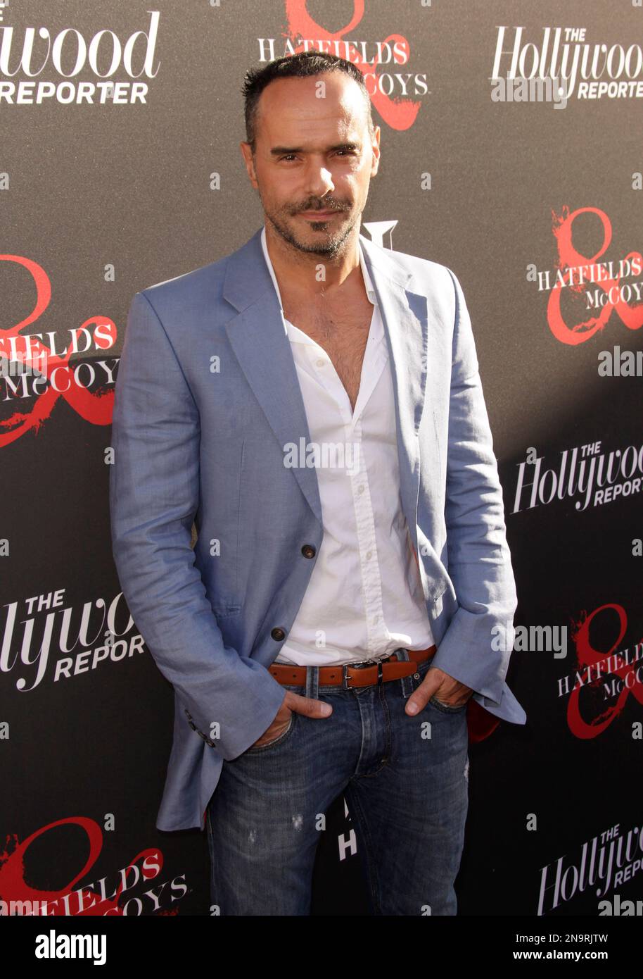 Actor Michael Greco arrives at the world premiere of Hatfields & McCoys ...