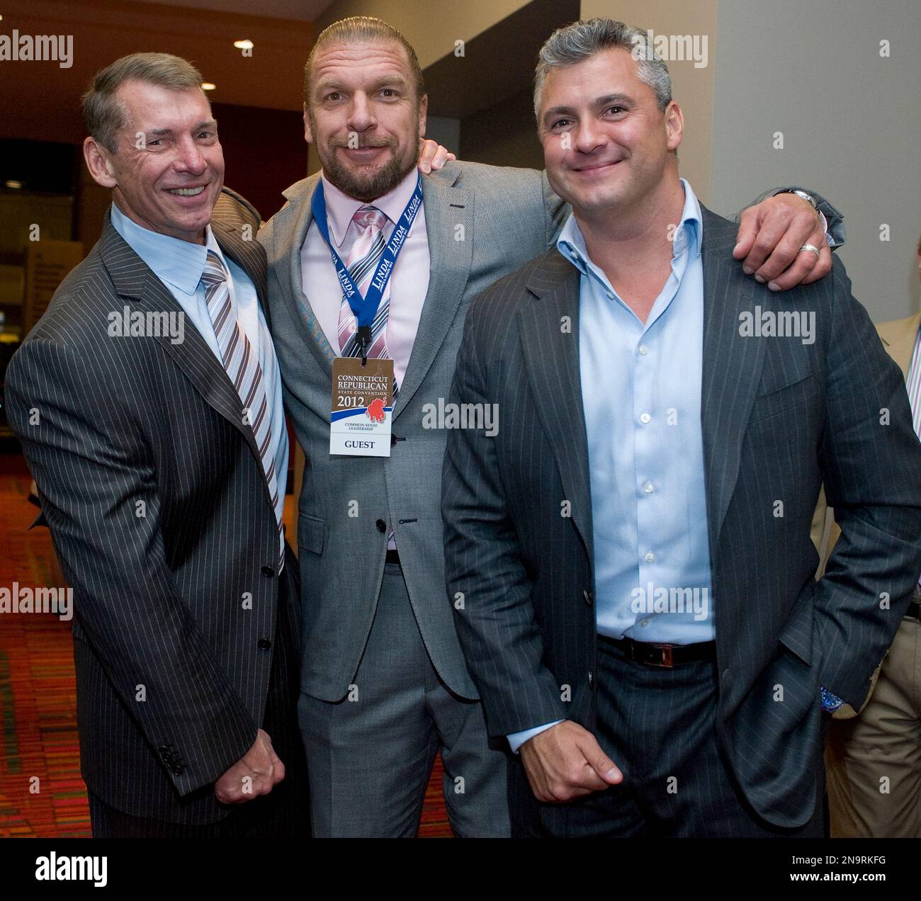 Vince McMahon, left, poses for a photo with son-in-law Paul Levesque as ...