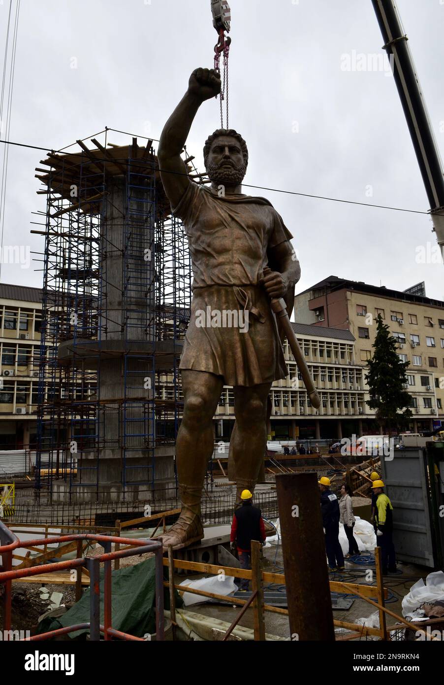 Workers prepare a 13-meter-high bronze statue named as "Warrior ...