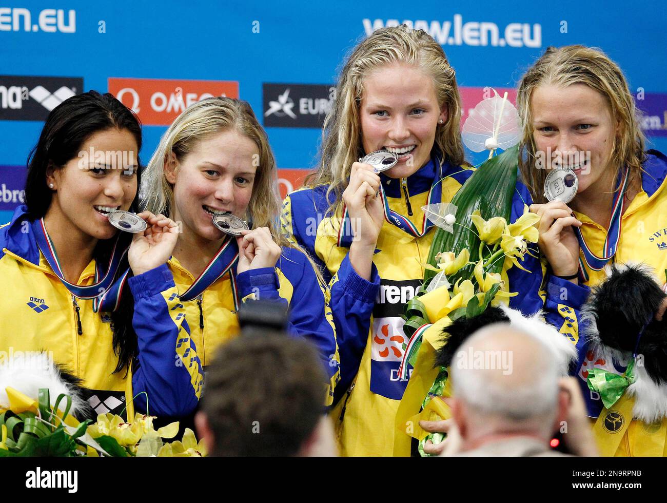 Sweden's team displays the silver medal they won in the Women's 4x100 ...