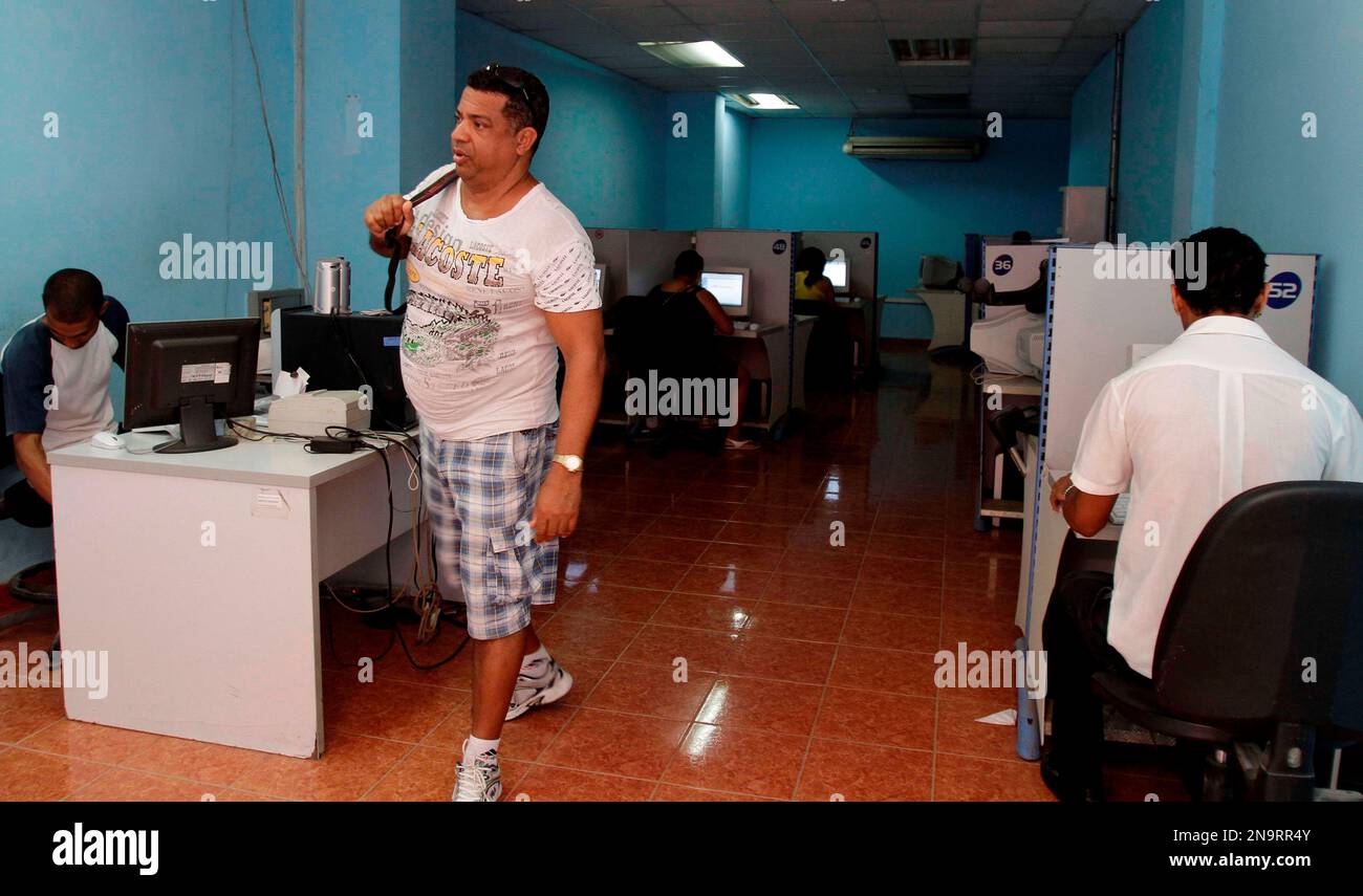 In this May 9, 2012 photo, a man leaves a state-run computer center in ...