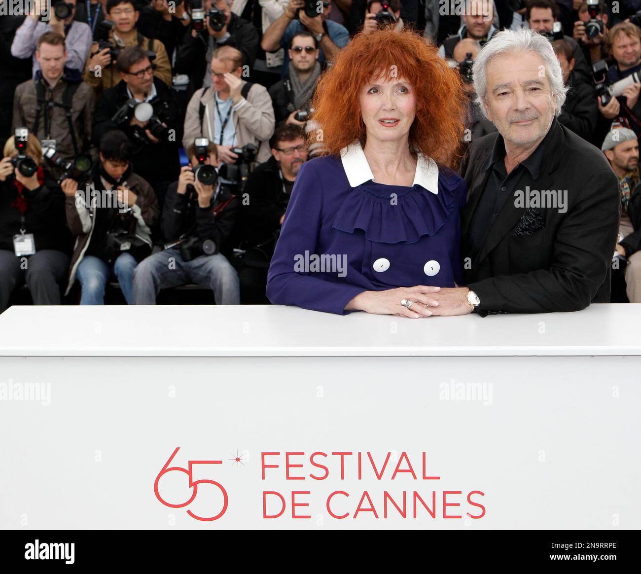 Actors Sabine Azema, left and Pierre Arditi pose during a photo call ...