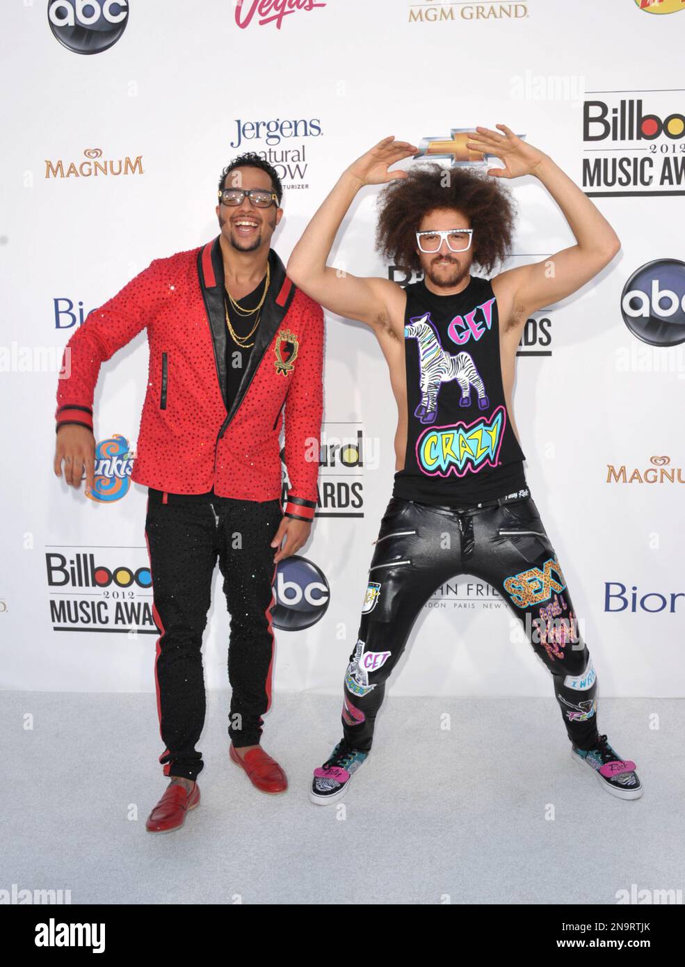 SkyBlu, left, and Redfoo of LMFAO arrive at the 2012 Billboard Awards ...