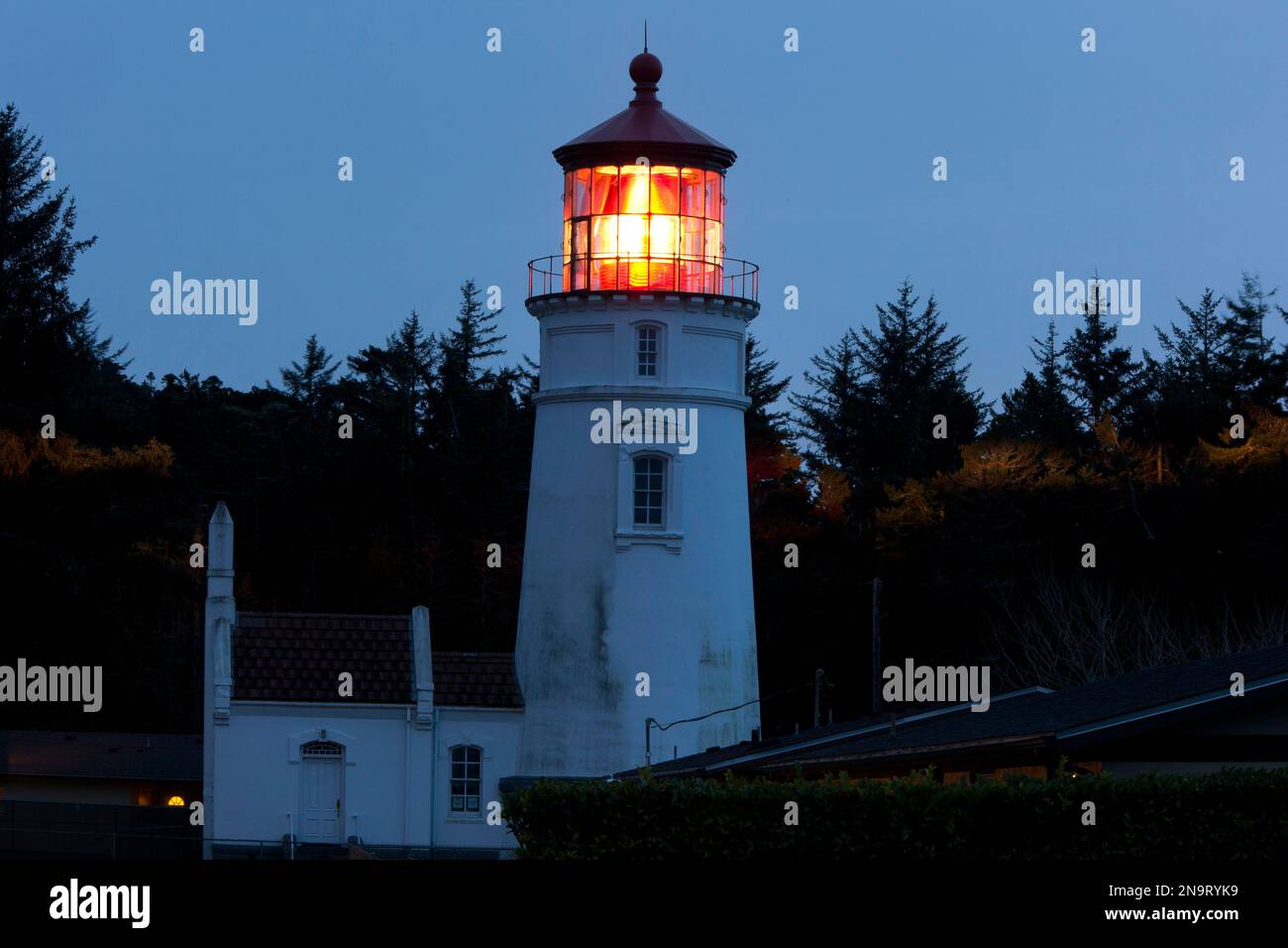 Umpqua River Lighthouse at twilight on the Oregon Coast in the Pacific ...