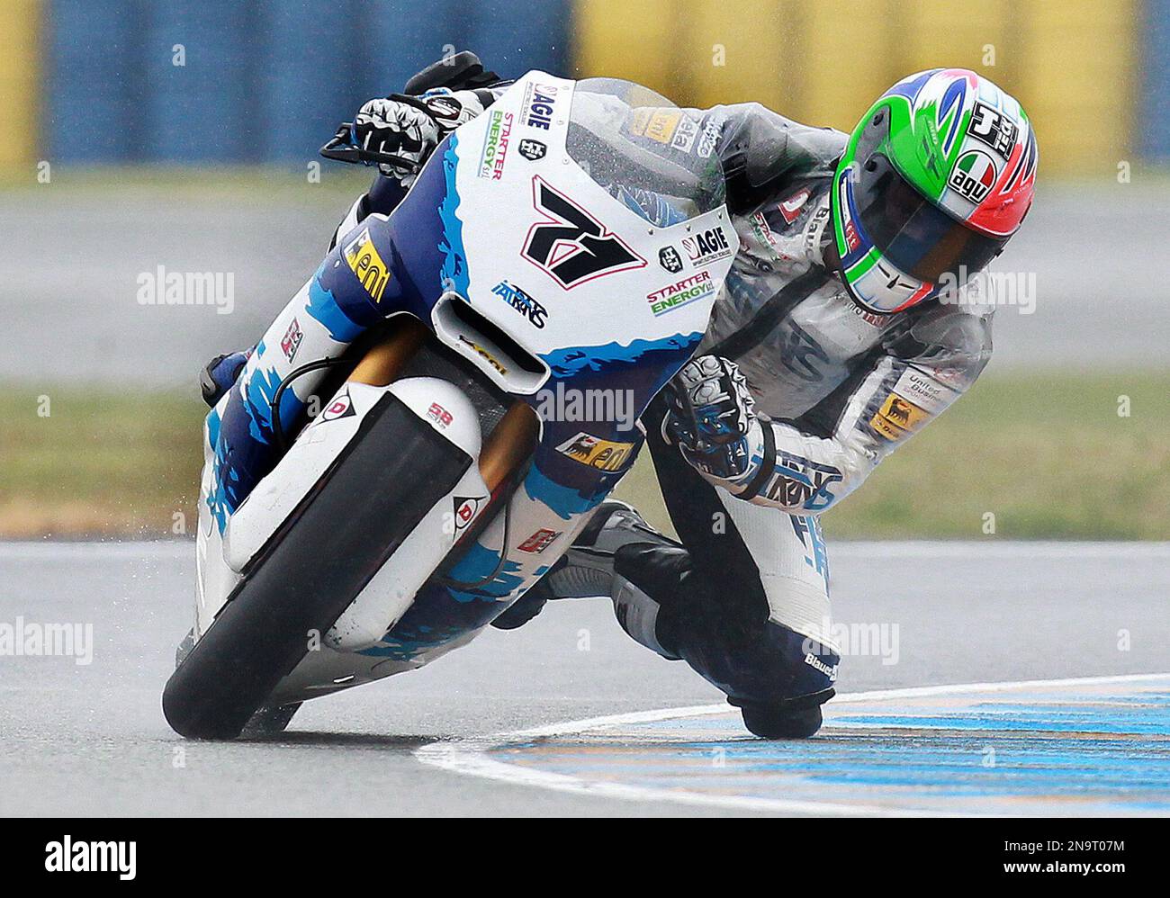 Moto2 rider Claudio Corti of Italy powers his moto into a curve at the ...