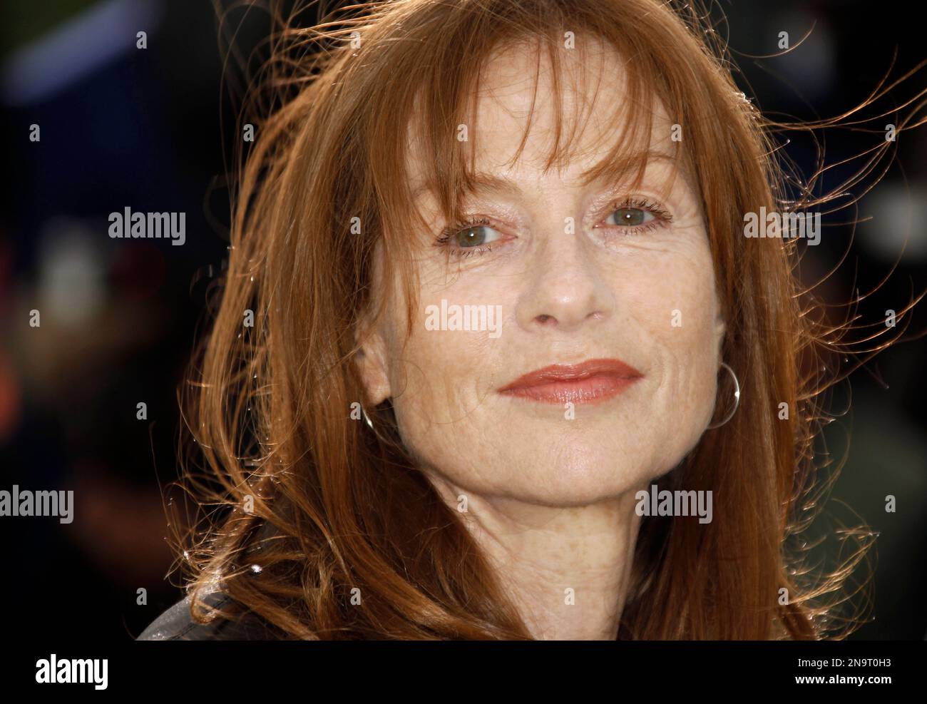 Actress Isabelle Huppert poses during a photo call for Love at the 65th ...