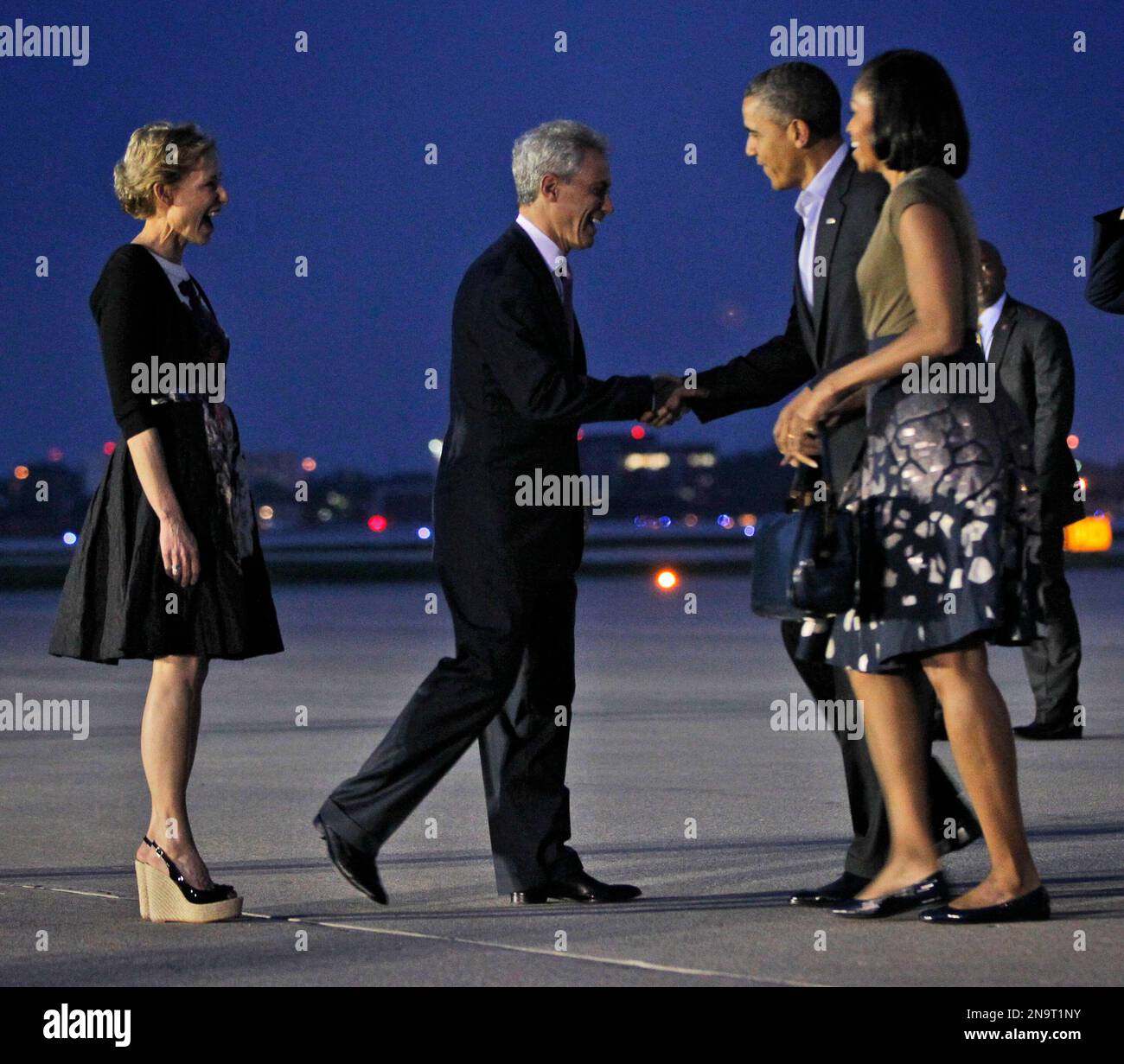 President Barack Obama and first lady Michelle Obama are greeted by ...