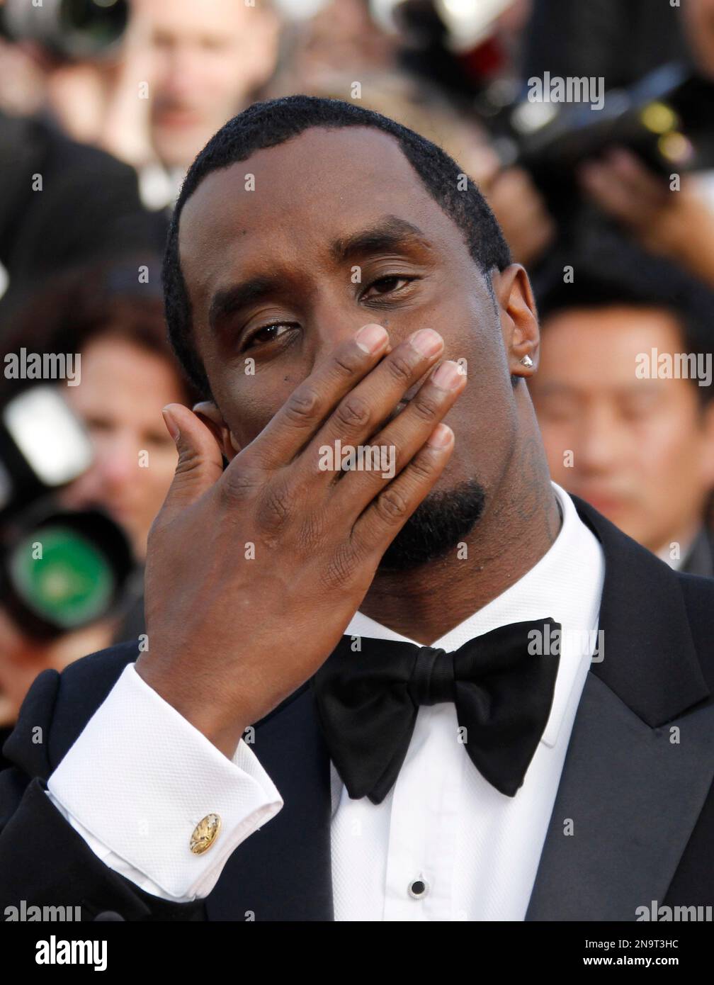 Singer Sean Combs arrives for the screening of Lawless at the 65th ...