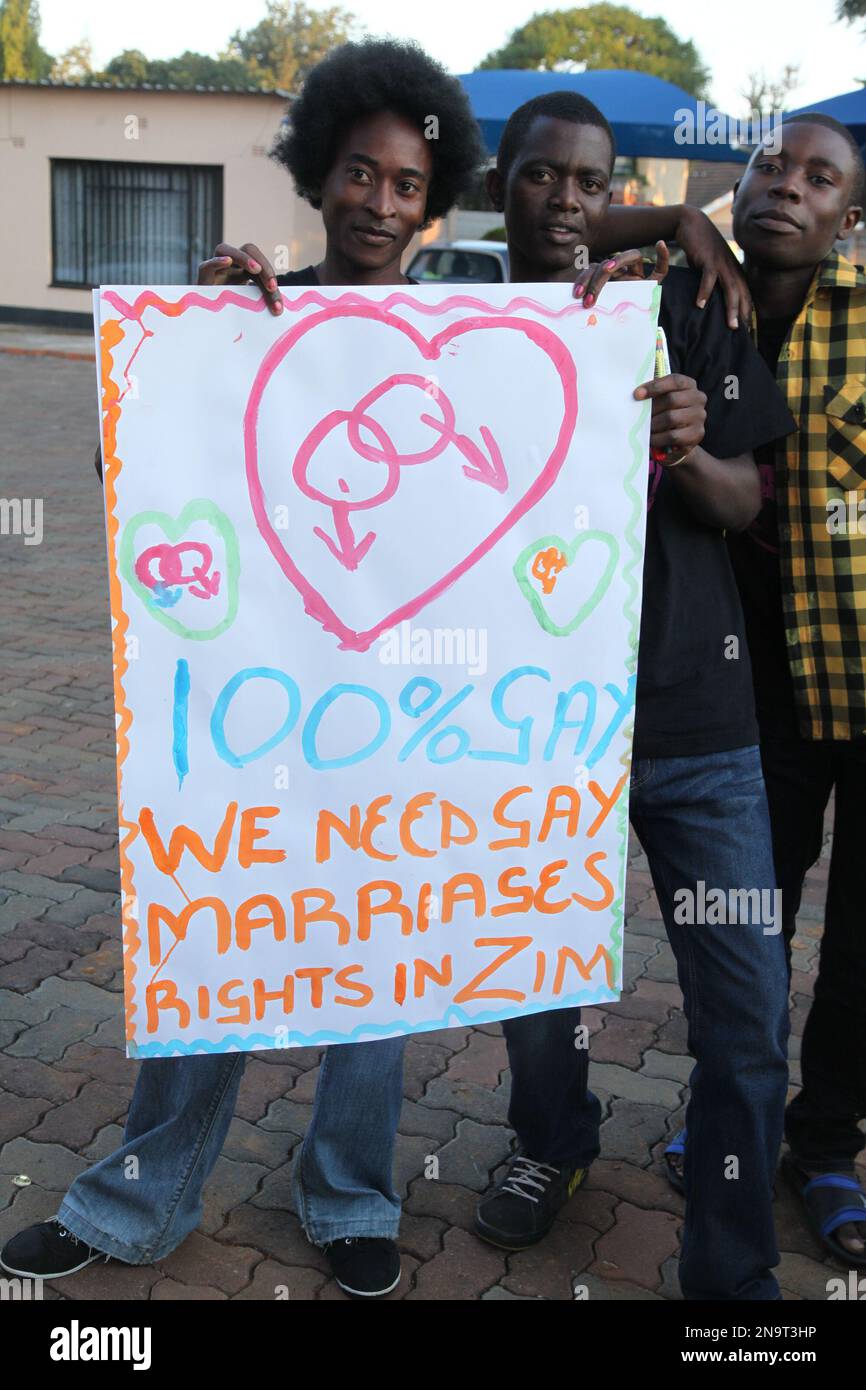 Members of the Gays and Lesbians Association of Zimbabwe, pose with a ...