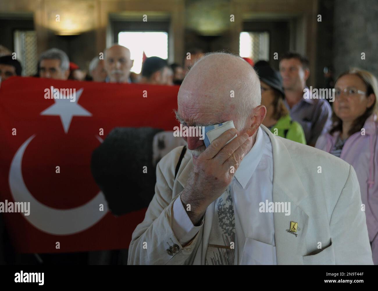 A Turkish man cries as thousands of people visit the mausoleum of ...