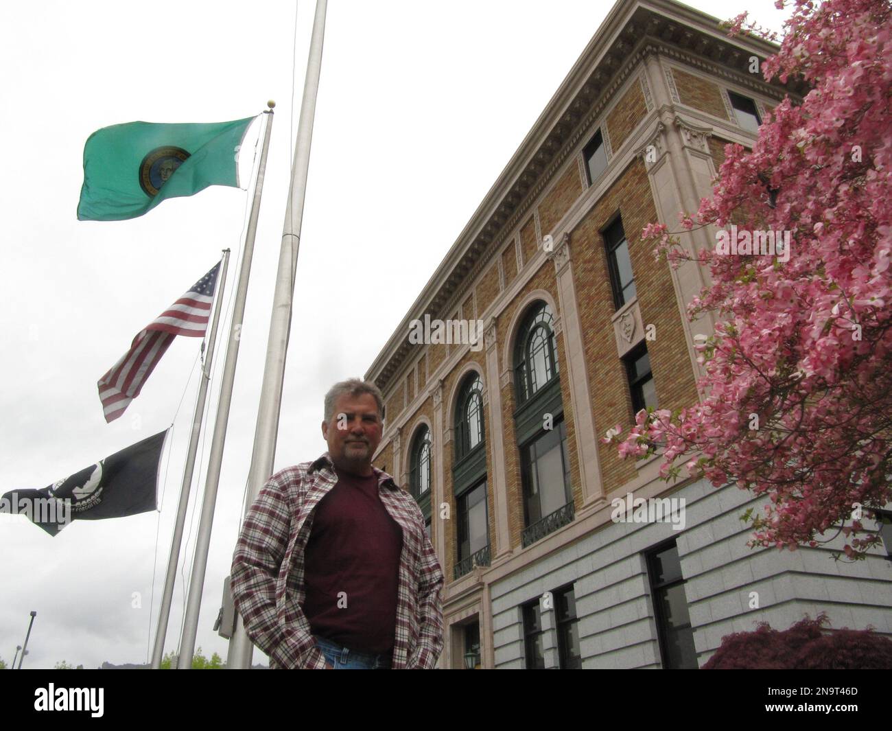 Reid Cowell stands outside the Chelan County Courthouse in Wenatchee ...
