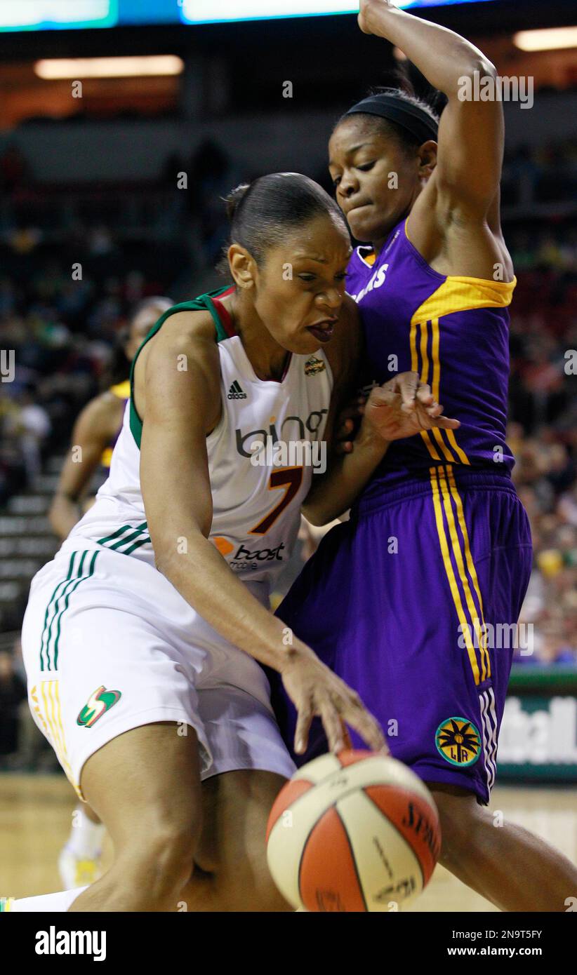 Seattle Storm's Tina Thompson, left, tries to get past Los Angeles ...