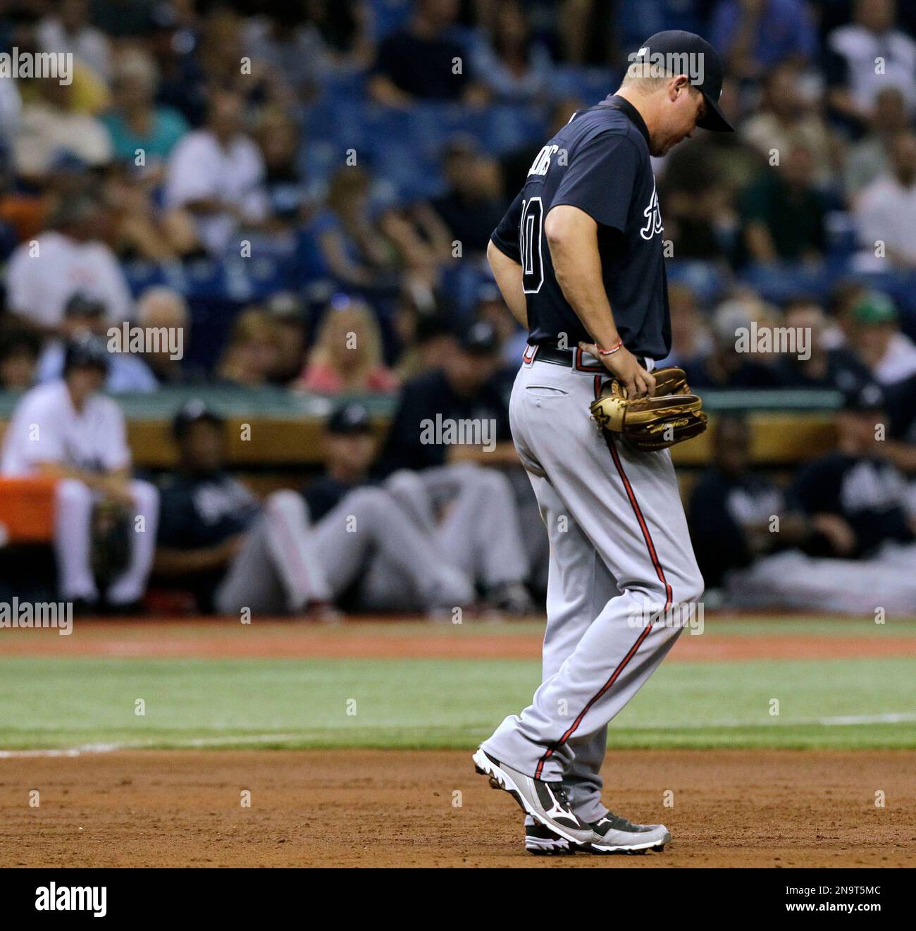 Atlanta Braves third baseman Chipper Jones walks around after getting ...